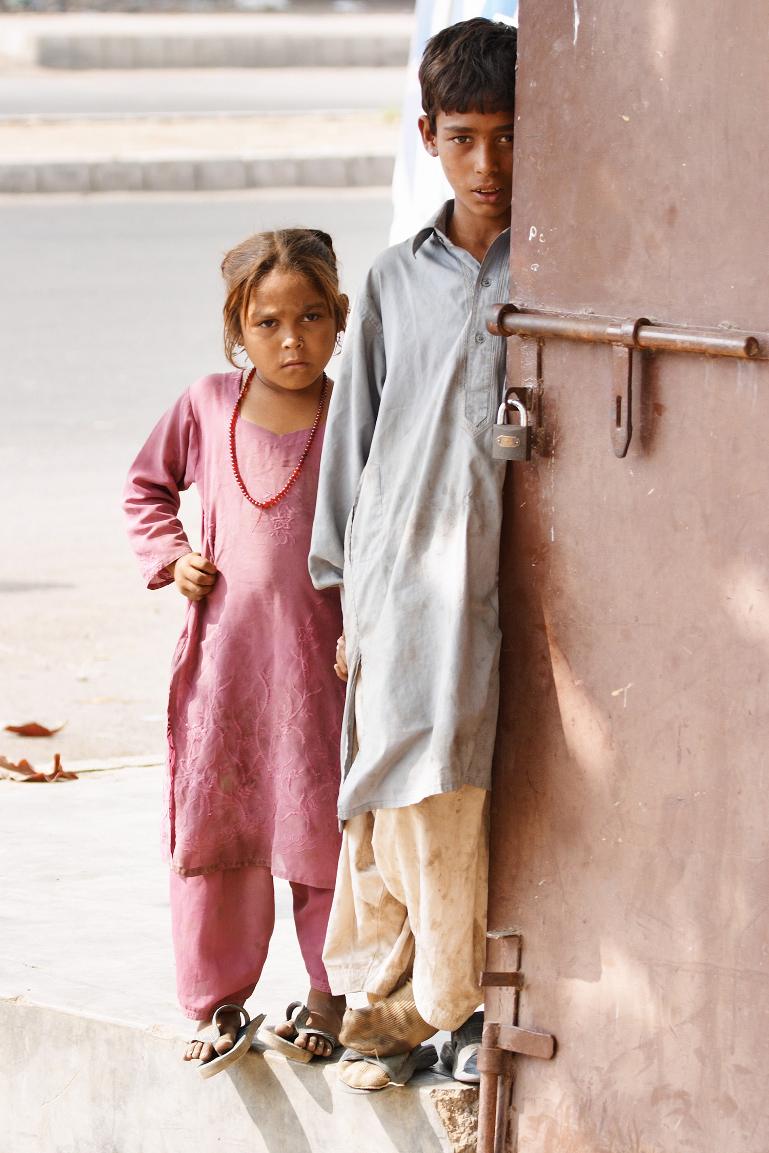 Two Needy Pakistani Children Waiting For Charity NAVLABS